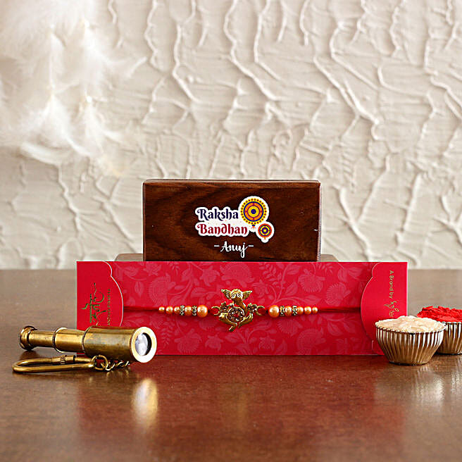 Ganesha Rakhi and Personalised Telescope Keychain Combo mauritius ...