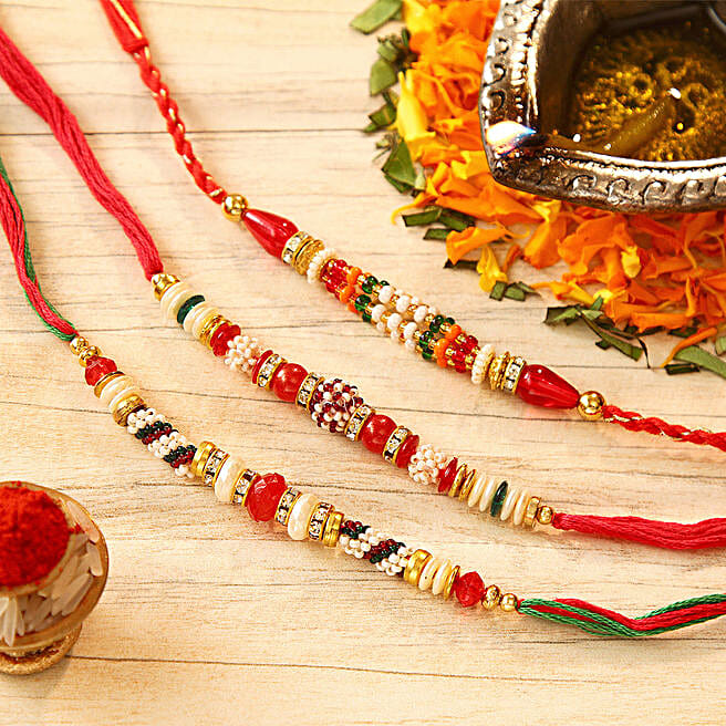 Colorful Rakhi Trio oman | Gift Colorful Rakhi Trio- FNP
