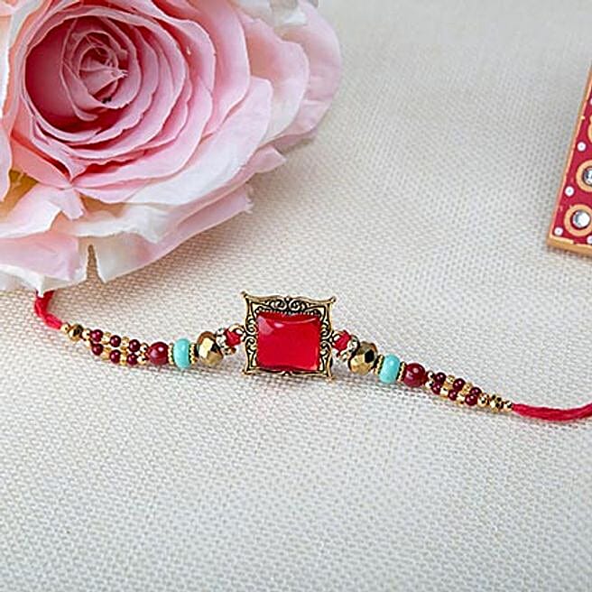 Square Pink Rakhi russia | Gift Square Pink Rakhi- FNP