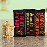 Buy/Send Amul Chocolates & Beige Ganesha Idol Combo Online- FNP