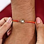 Buy/Send 18K Bajrang Bali Gold Rakhi Online- FNP