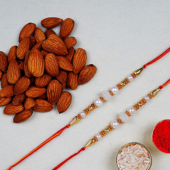 Divine Golden Pearl Thread Rakhi With Almonds singapore | Gift Divine ...