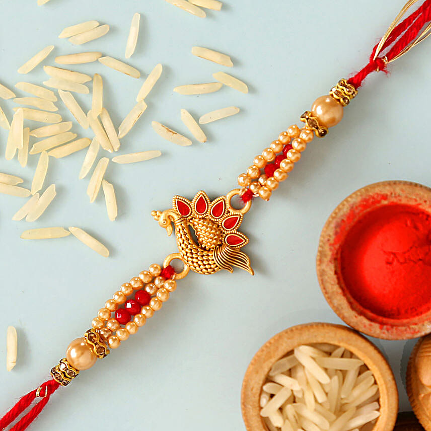 Lovely Red Peacock Designer Rakhi Singapore T Lovely Red Peacock Designer Rakhi Fnp