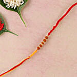 Yellow Red Rakhi Thread with Rudraksha sweden | Gift Yellow Red Rakhi ...