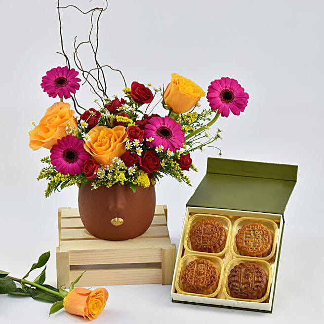 Chromatic Flower Arrangement and Moon cake uae | Gift Chromatic Flower ...