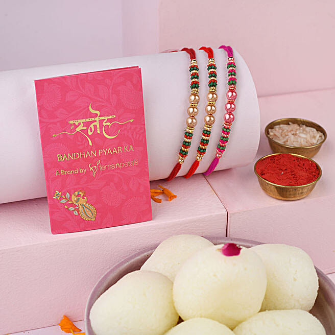 Sneh Gleaming Pearls Rakhi Set & Rasgulla uae | Gift Sneh Gleaming ...