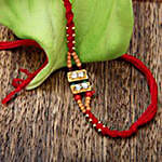 Tarditional Chandan Rakhi uae | Gift Tarditional Chandan Rakhi- FNP