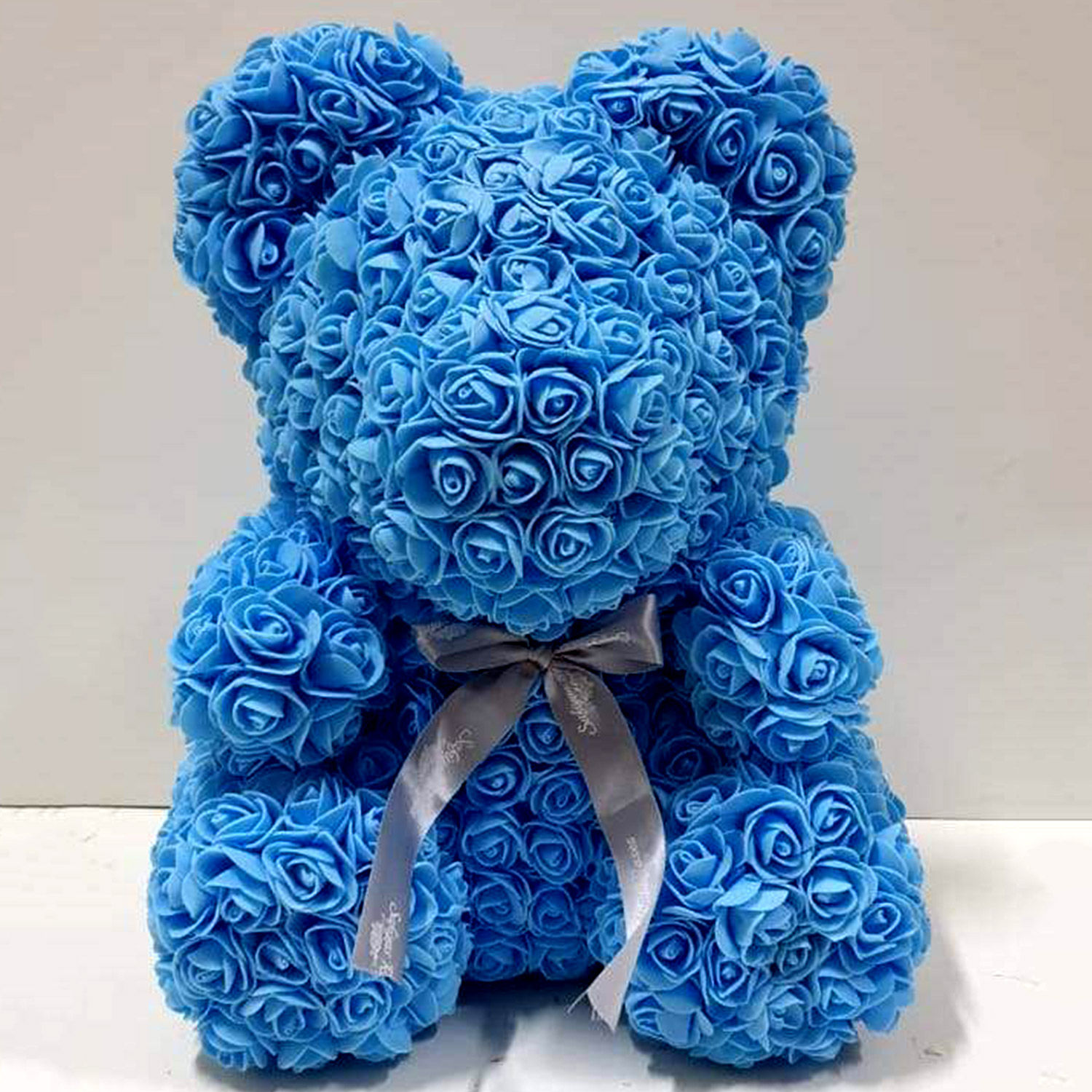 Teddy Bear With Blue Roses