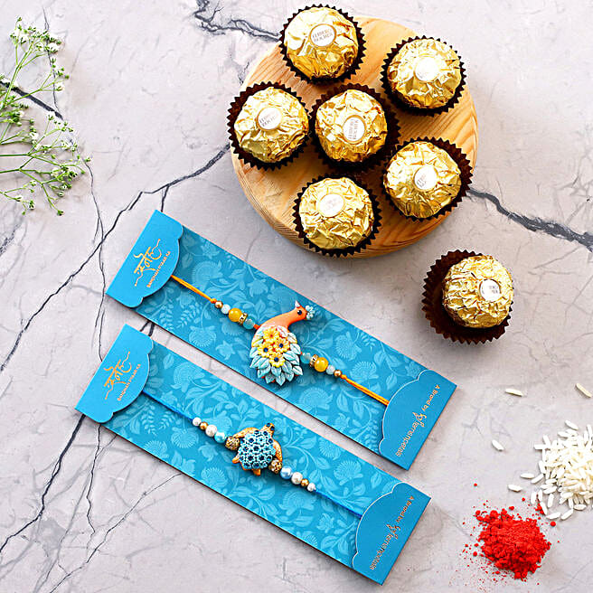 Peacock And Turtle Rakhi Set With 3 Pcs Ferrero Rocher usa | Gift ...