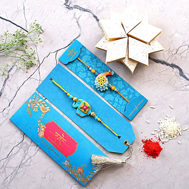 Blue Elephant And Peacock Rakhi Set With Kaju Katli usa | Gift Blue ...