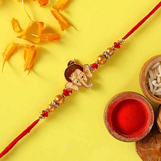 Long Trunk Bal Ganesha Pearl Rakhi For Kids With 3 Ferrero Rocher Exp ...