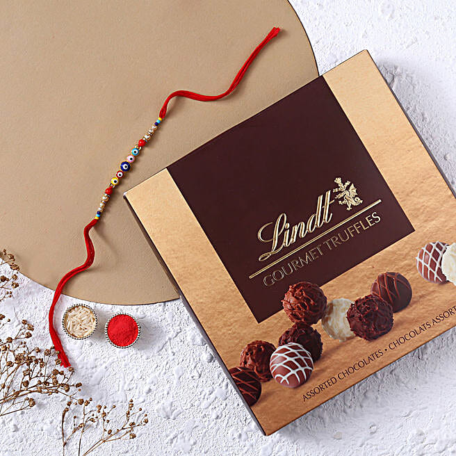 Sneh Multi Evil Eye Rakhi & Lindor Gourmet Truffles usa | Gift Sneh ...